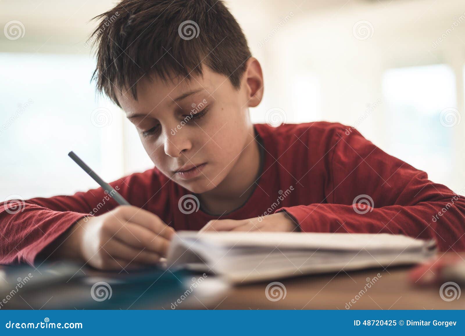 Boy writing stock image. Image of school, horizontal - 48720425