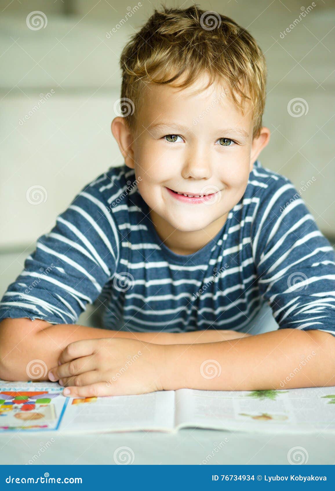 Boy is Writing on His Copybook Stock Photo - Image of activity, playful ...