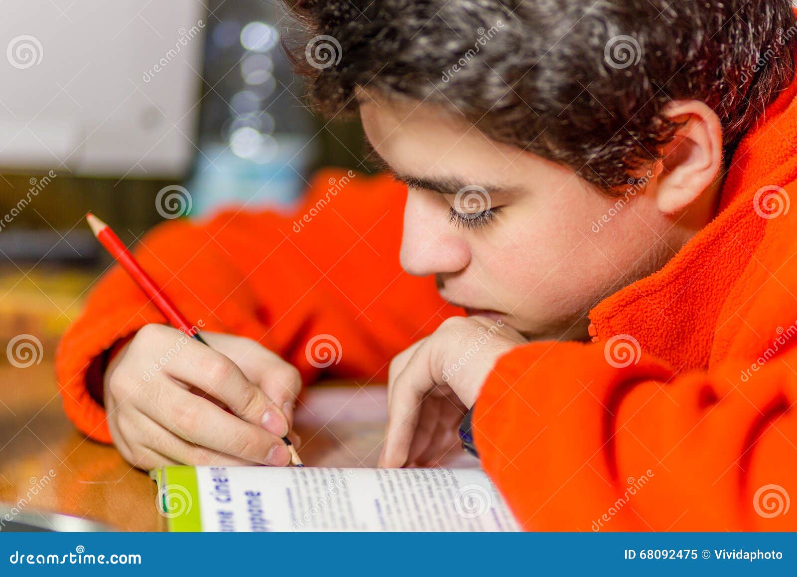 Boy Writing with Red and Blue Pencil Stock Image - Image of focused ...