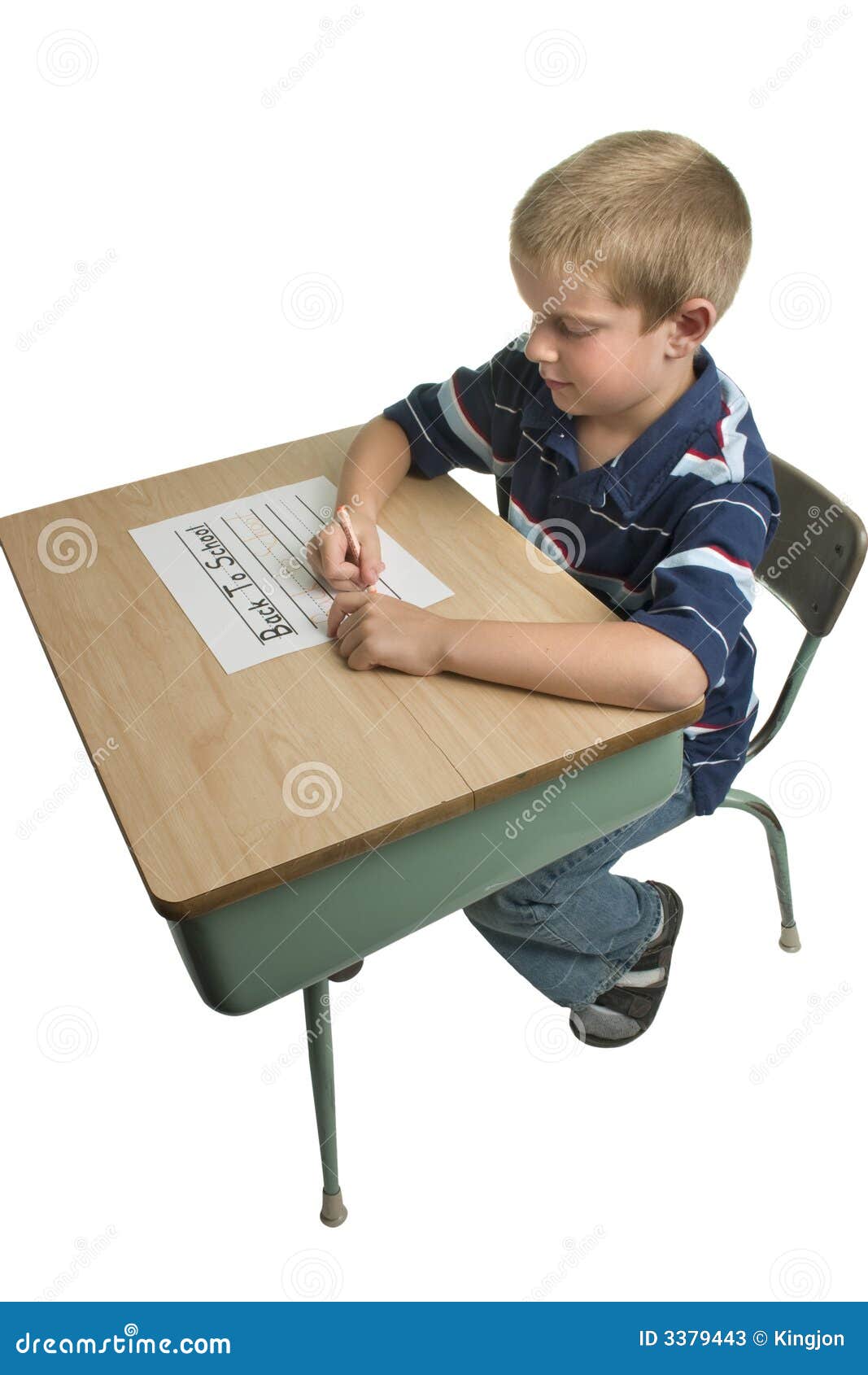 Boy writing on school desk stock image. Image of classroom - 3379443