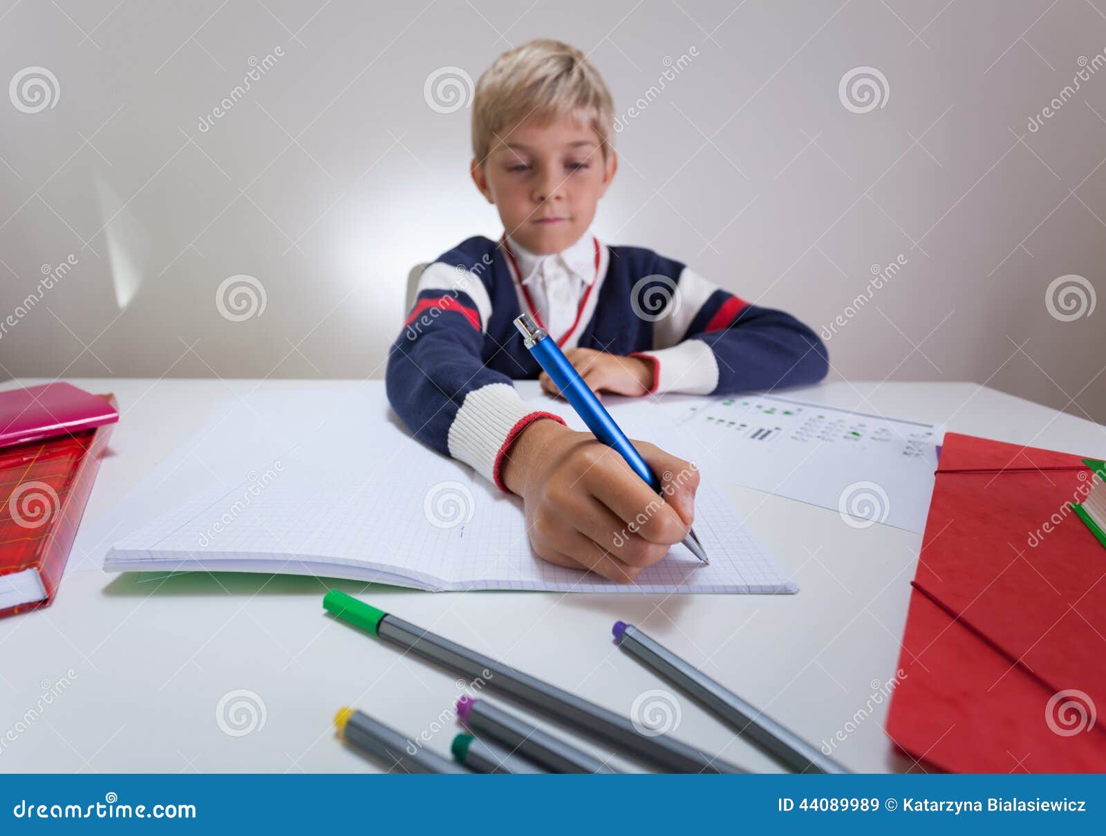 Boy Writing Something in Notebook Stock Image - Image of school, notes ...