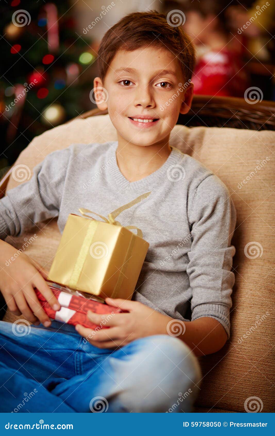 Boy with xmas presents stock photo. Image of cheerful - 59758050