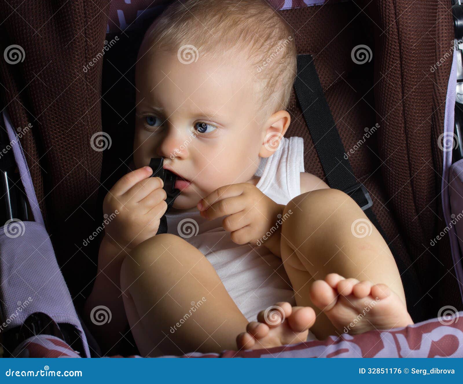 Boy (1 year) on pram stock photo. Image of health, face - 32851176