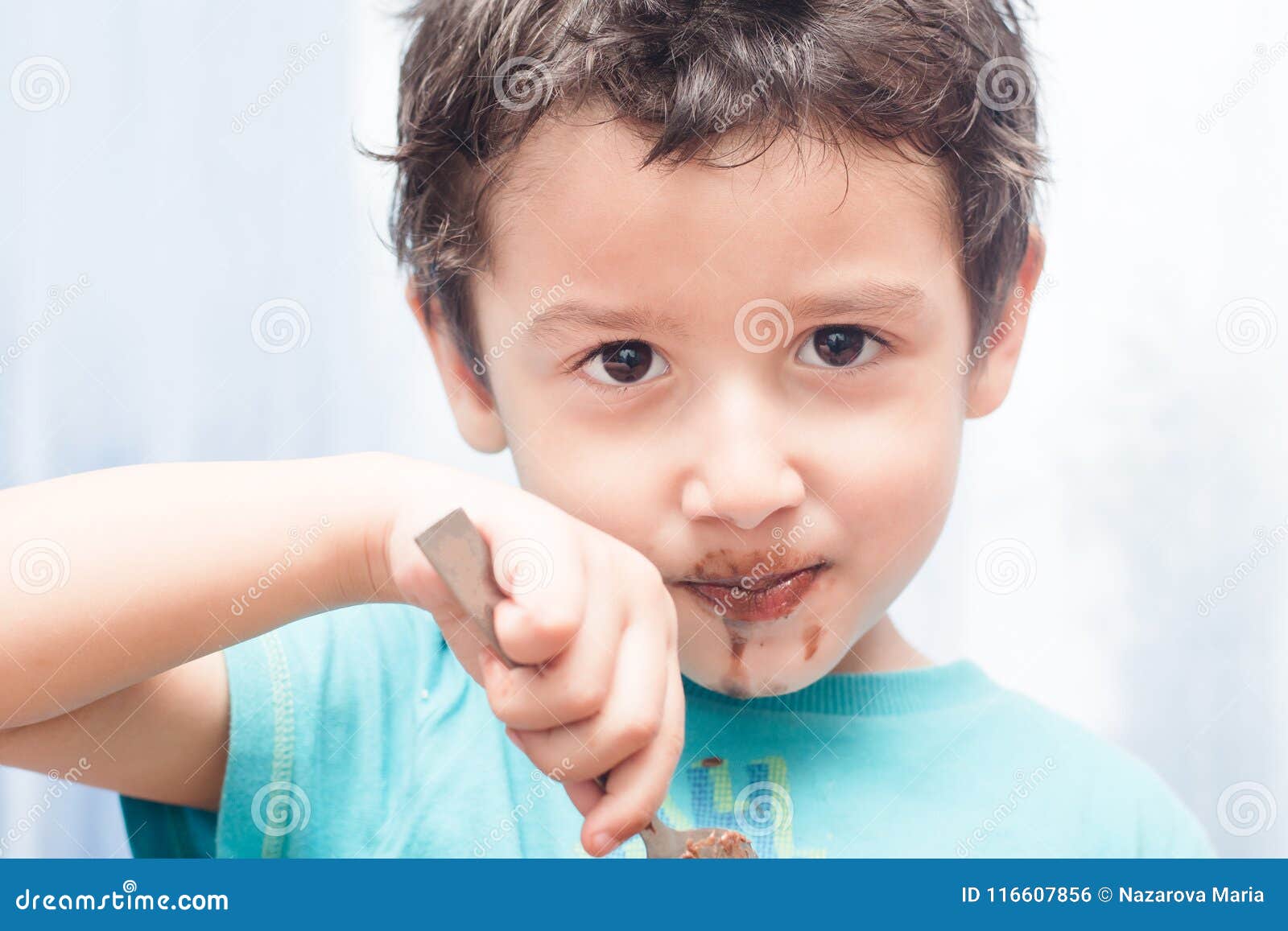 Boy eating the sweetness stock photo. Image of little - 116607856