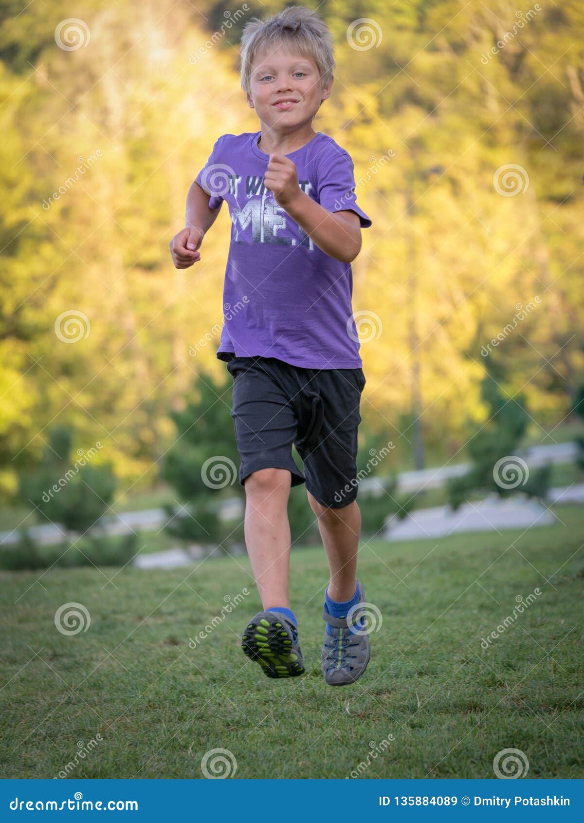 The Boy Quickly Runs on Green Lawn Stock Image - Image of head, buddy ...