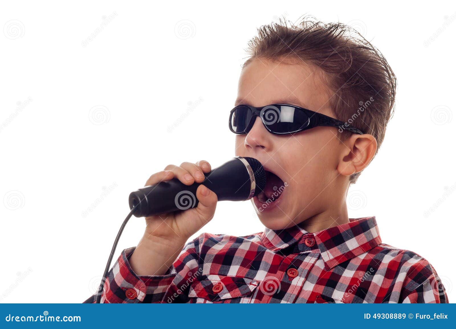 Boy yelling in microphone stock image. Image of singer - 49308889