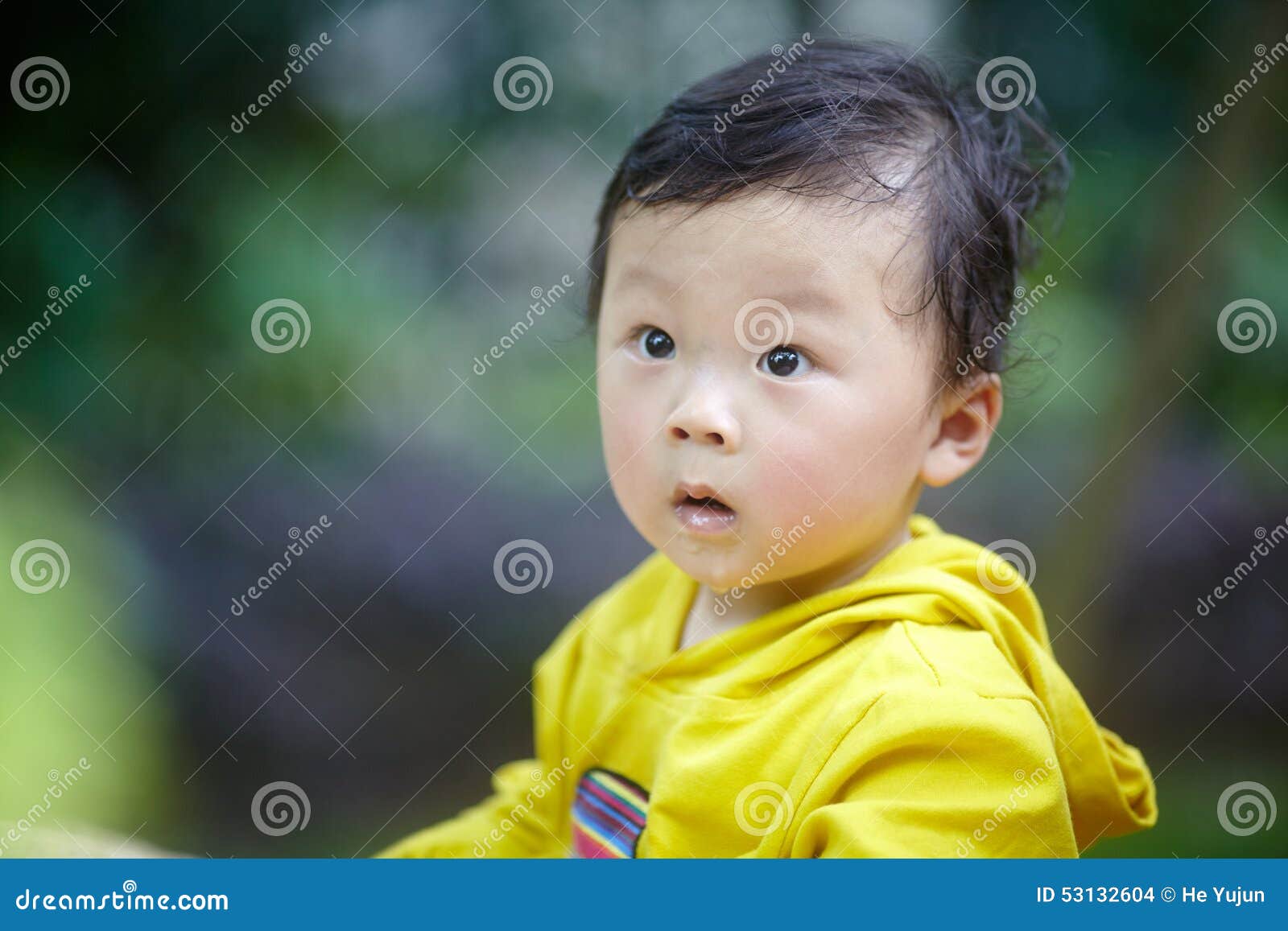 Boy in yellow stock photo. Image of looking, chongqing - 53132604