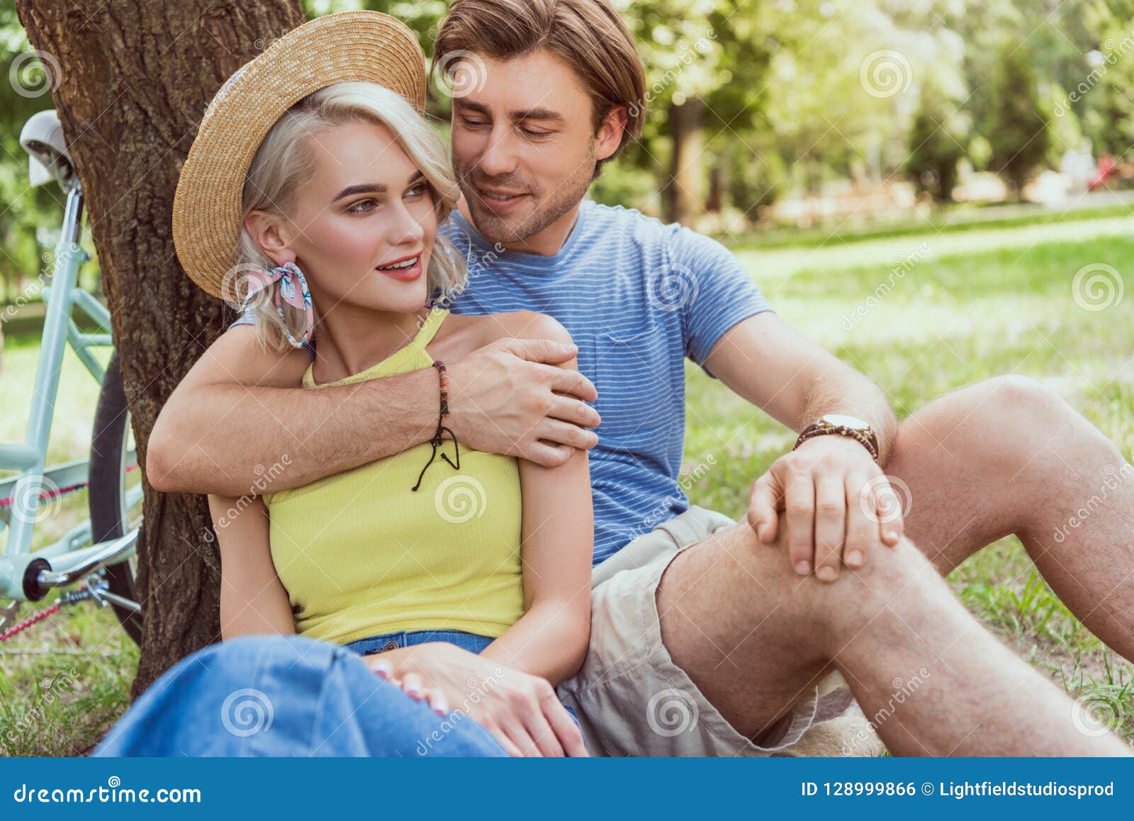 Boyfriend Cuddling Girlfriend in Straw Hat Stock Photo - Image of ...