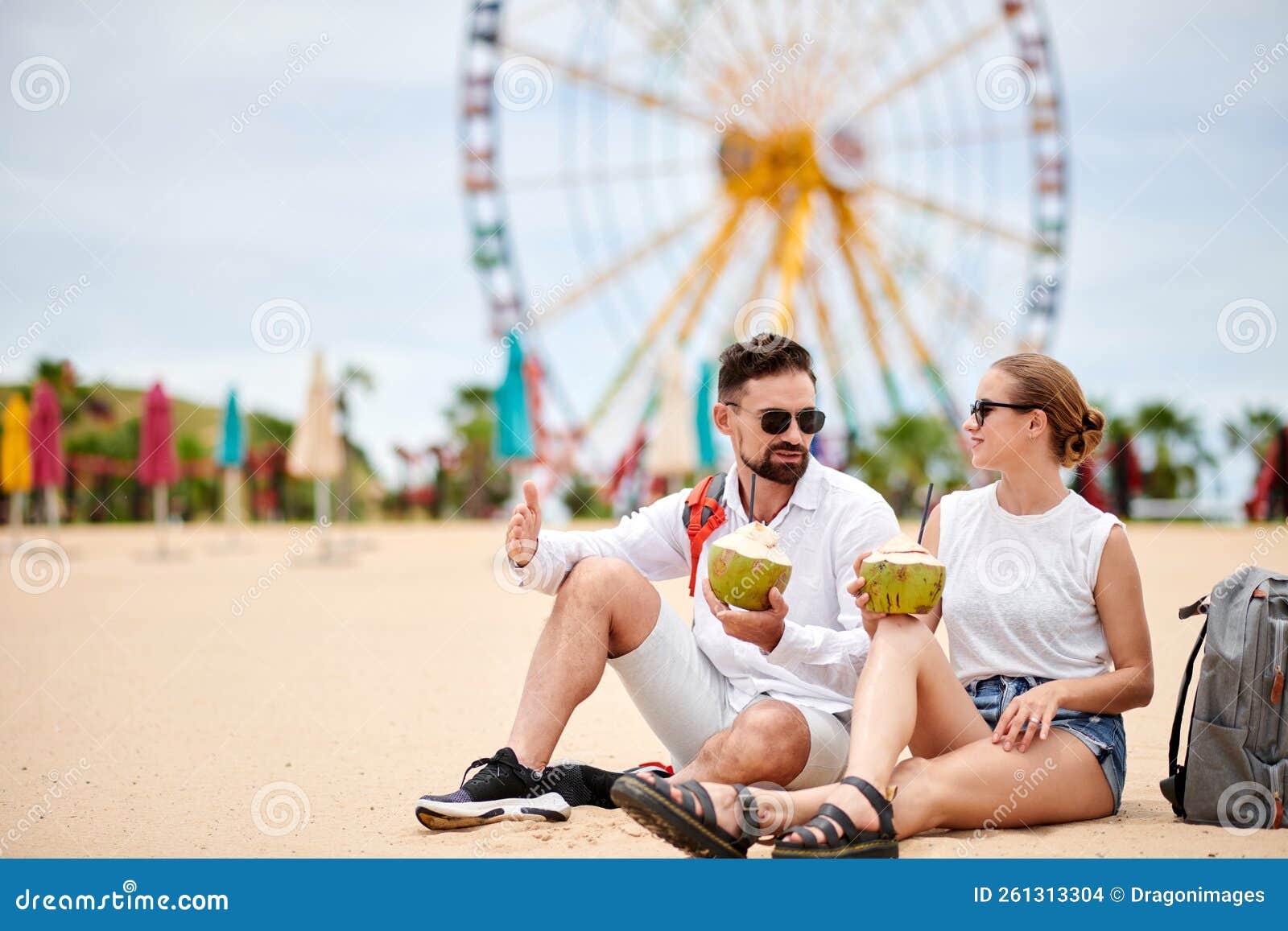 Boyfriend and Girlfriend Resting on Beach Stock Photo - Image of ...
