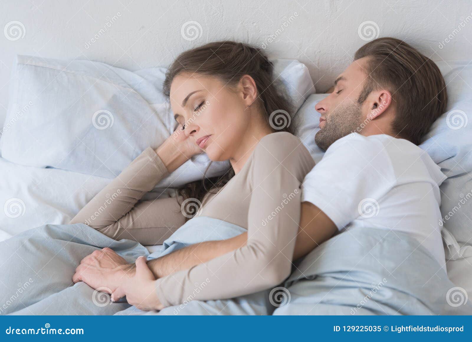 Boyfriend Hugging Girlfriend from the Back while Sleeping Stock Image ...