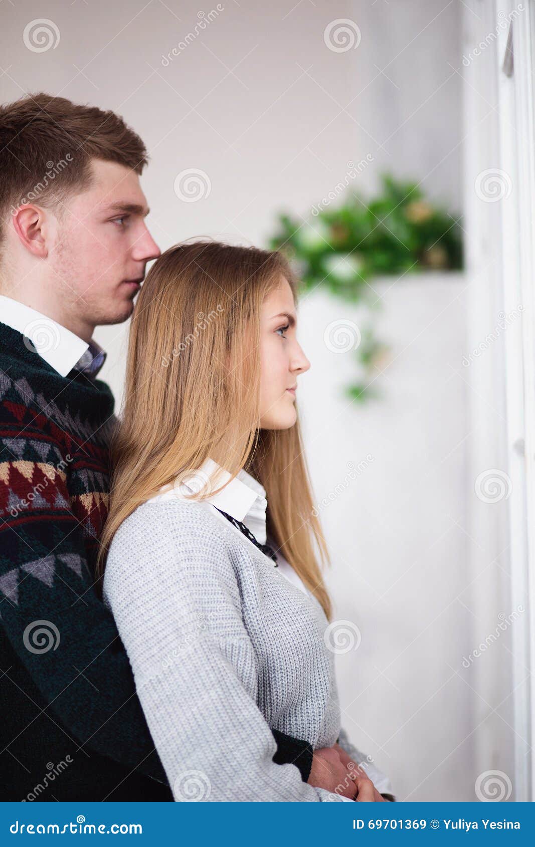 Boyfriend Hugging Girlfriend and Looking at the Mirror Stock Image ...
