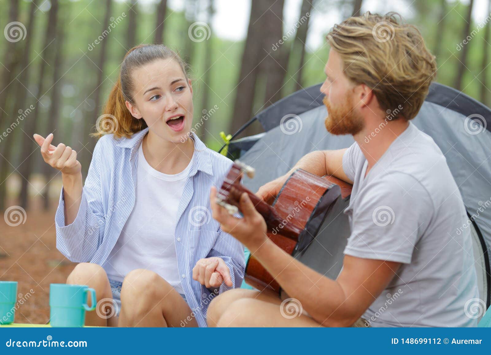 Boyfriend Playing Guitar Partner Singing Outside Tent Stock Photo ...