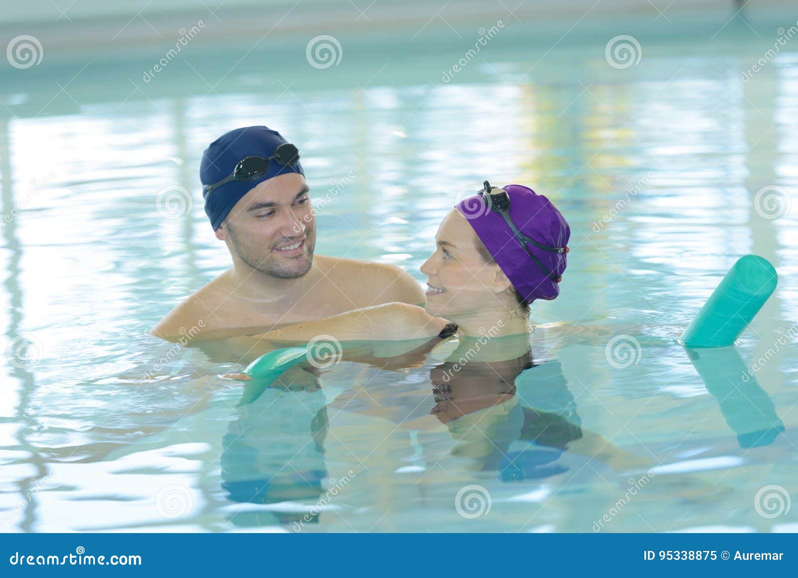Boyfriend Teaches Girlfriend To Float in Swiming Pool Stock Image ...