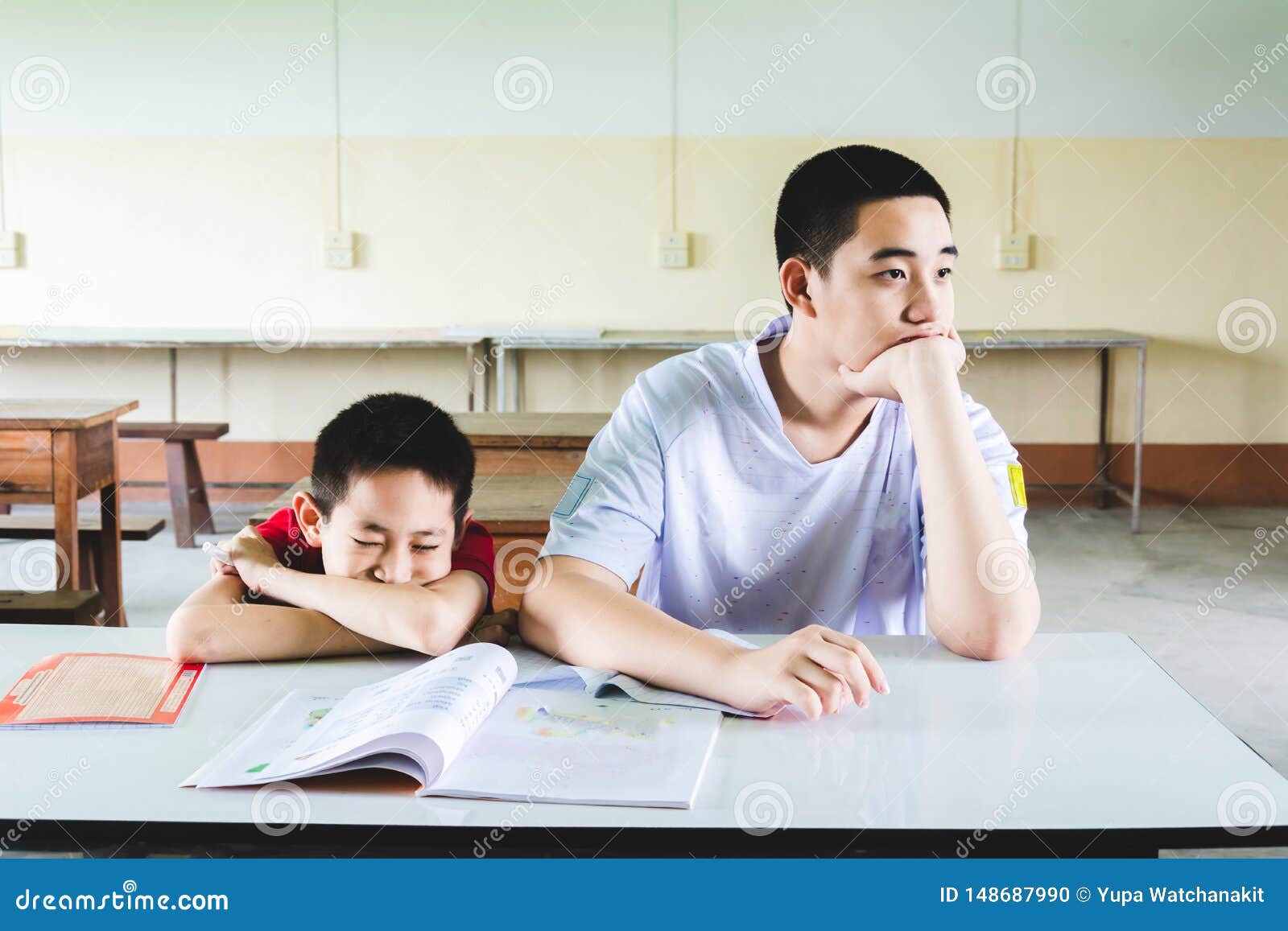 Boys are boring to study stock photo. Image of people - 148687990