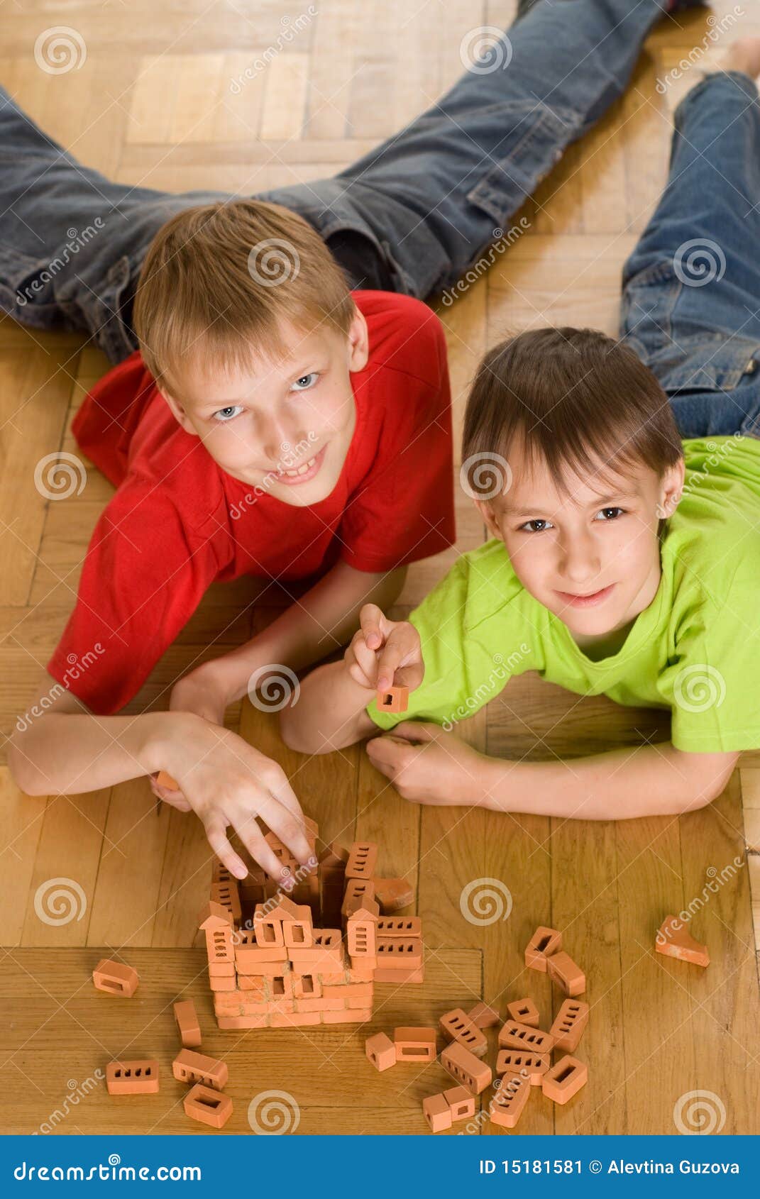 Boys are Building on the Floor Stock Image - Image of full, home: 15181581