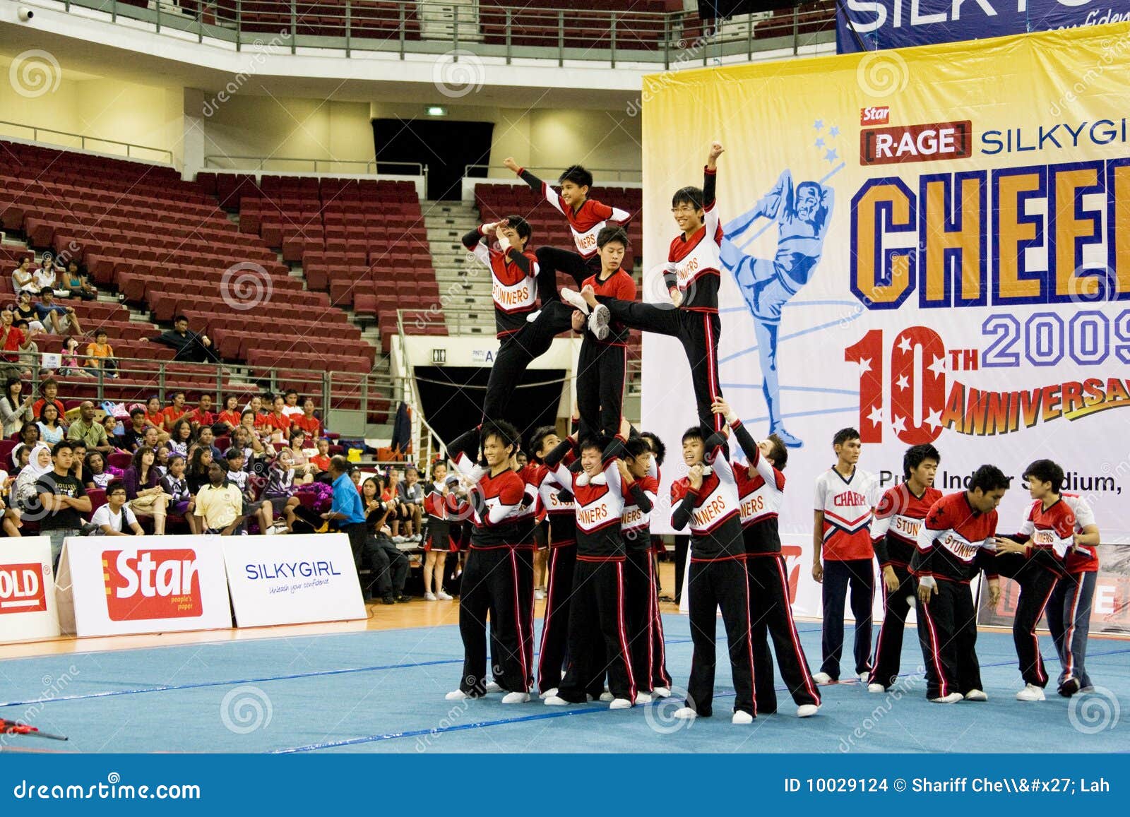 Boys Cheerleading Action editorial stock image. Image of championship ...