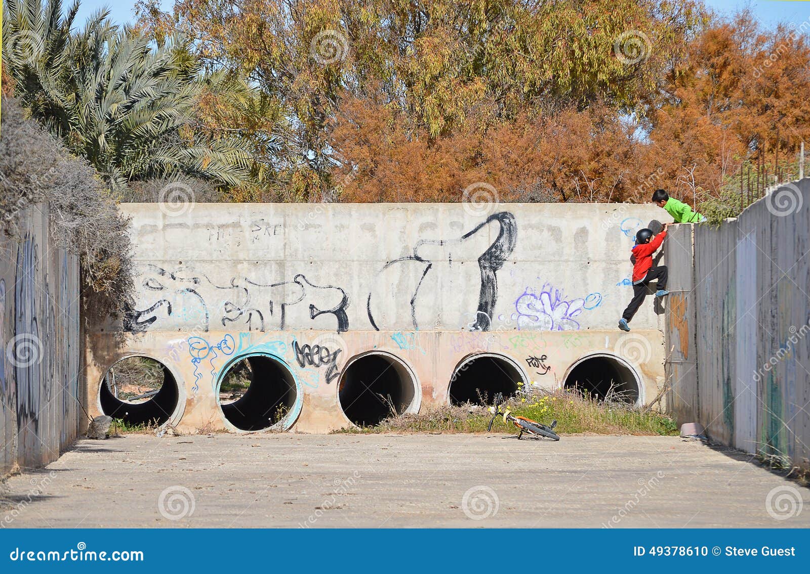 Boys Climbing - Drainage Pipes Flood Channel Stock Photo - Image of ...