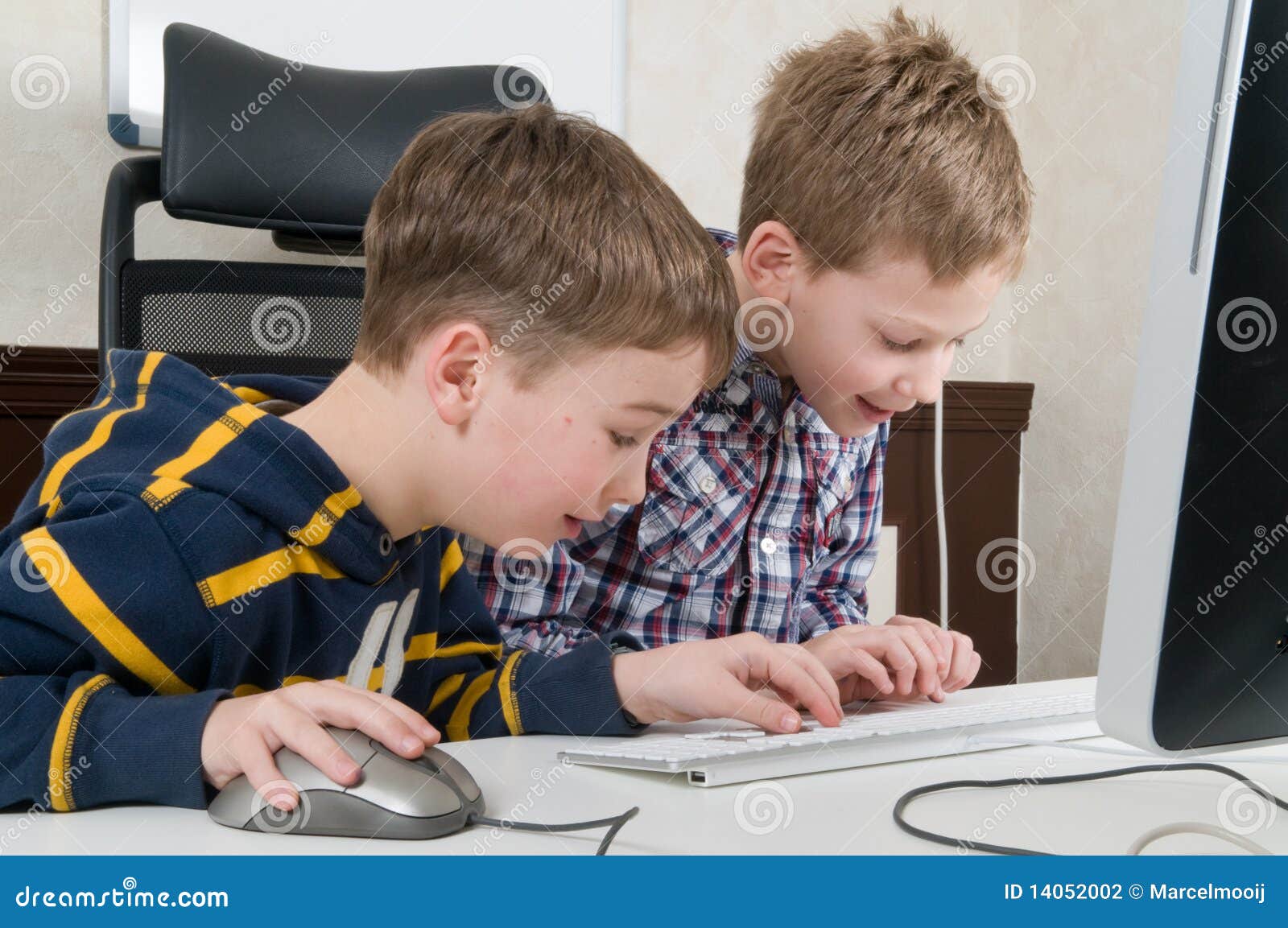 Boys on a computer stock photo. Image of friends, internet - 14052002