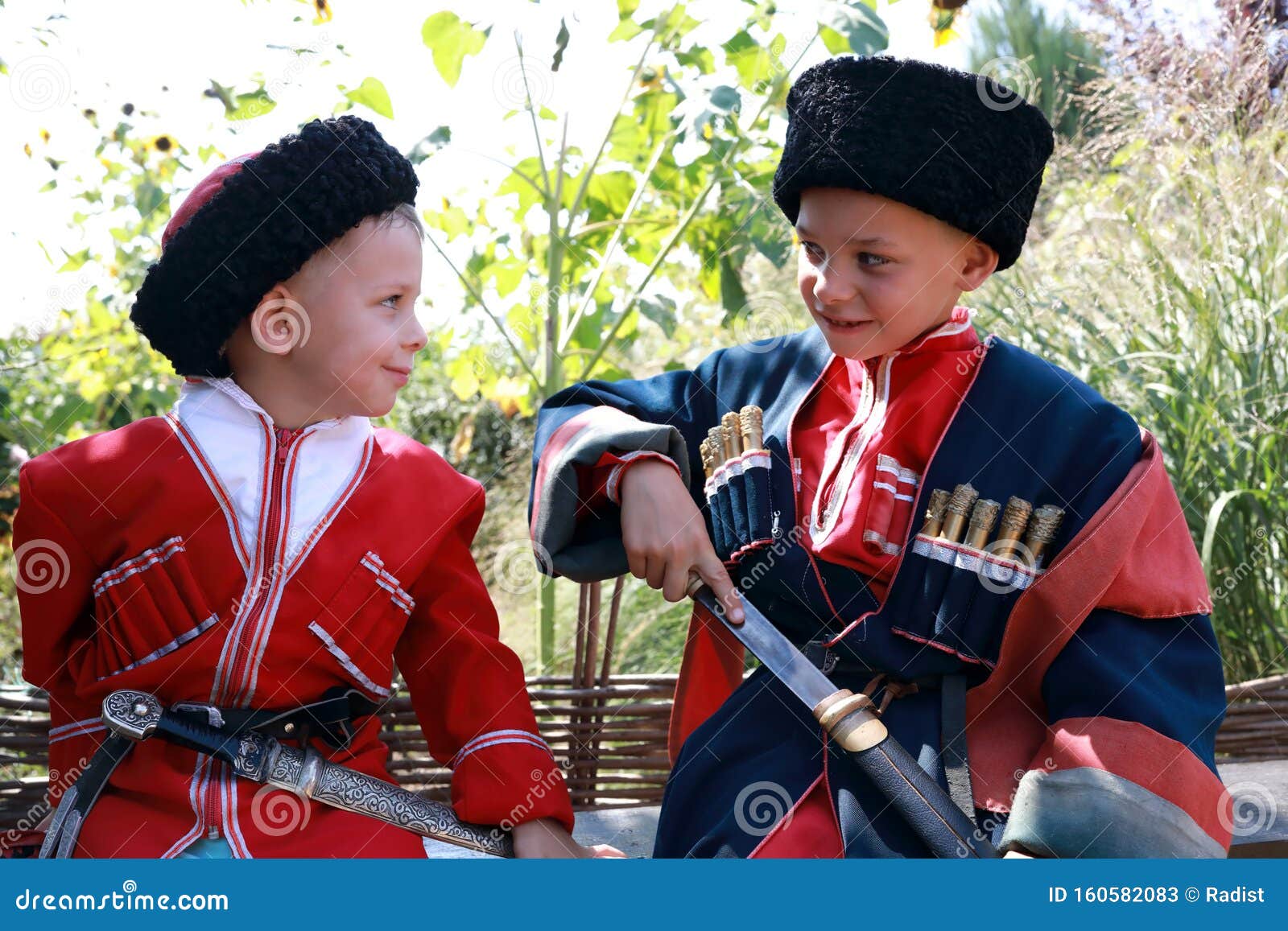 Boys in Cossack costumes stock image. Image of portrait - 160582083