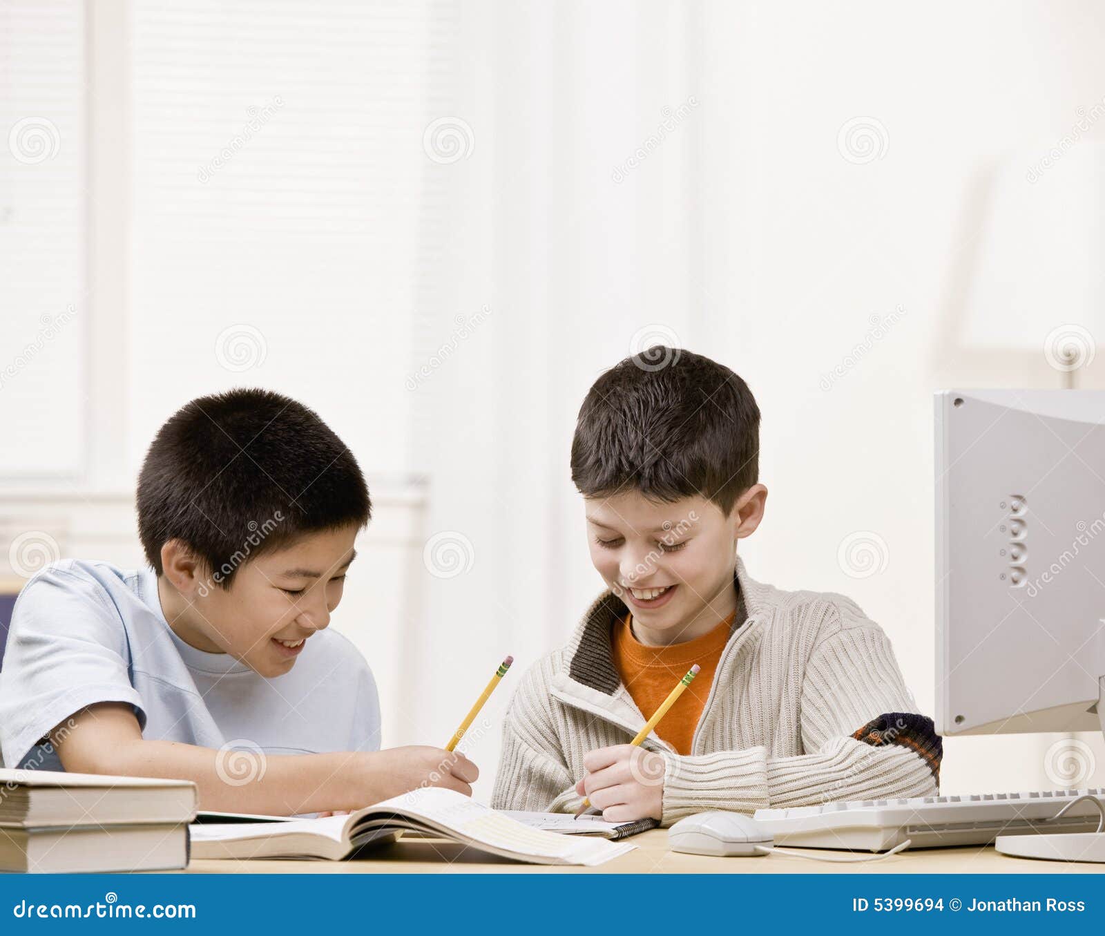 Boys Doing Homework Together Stock Photo - Image of head, friend: 5399694