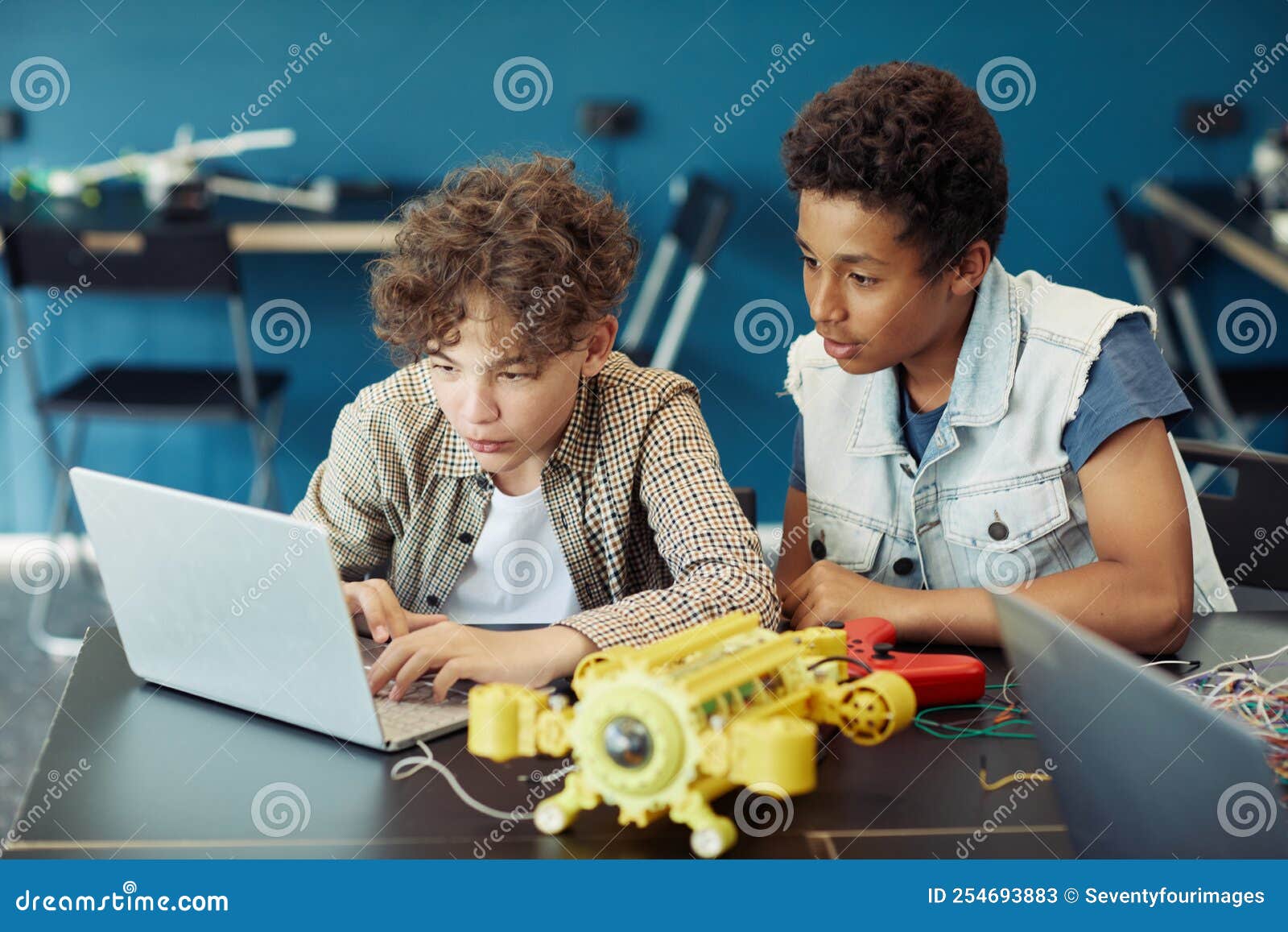 Boys in Engineering Class stock image. Image of school - 254693883