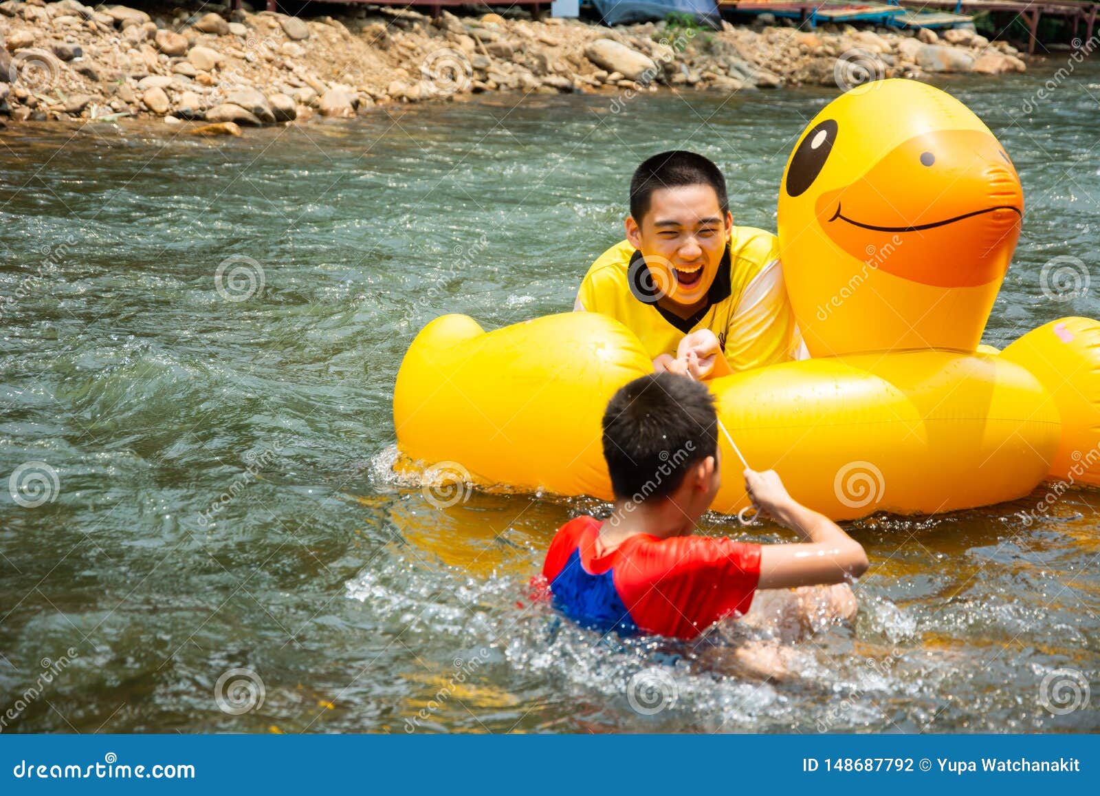 Boys Enjoy and Has Fun Rowing Downstream Stock Photo - Image of ...