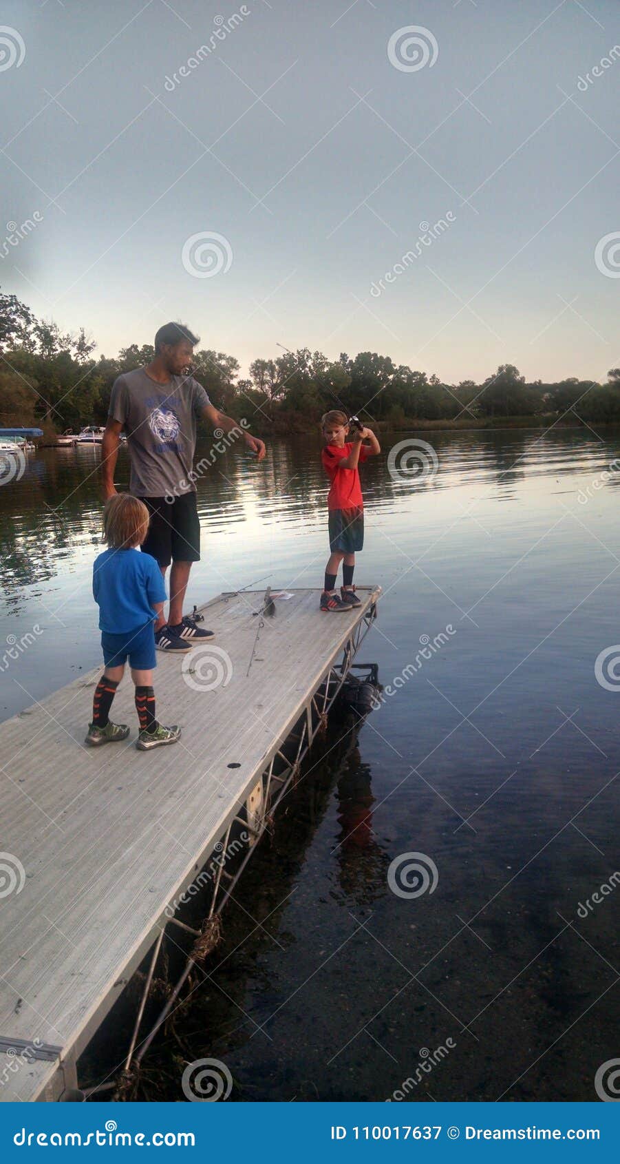 Boys fishing editorial photography. Image of lake, fishing - 110017637