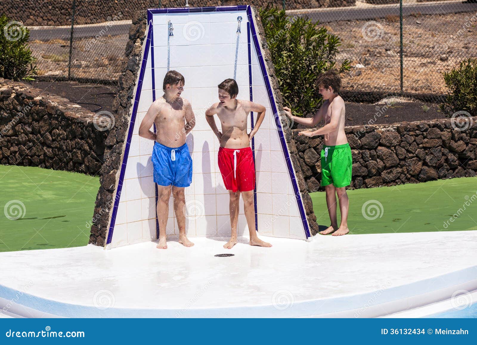 Boys Have Fun Unter the Pool Shower Stock Photo - Image of outdoors ...