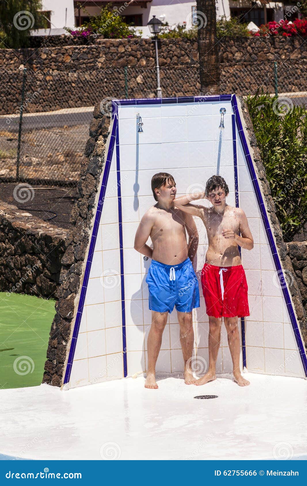 Boys Have Fun Unter the Pool Shower Stock Photo - Image of laugh ...