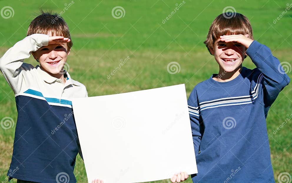 Boys Holding Sign stock photo. Image of domestic, families - 3407882