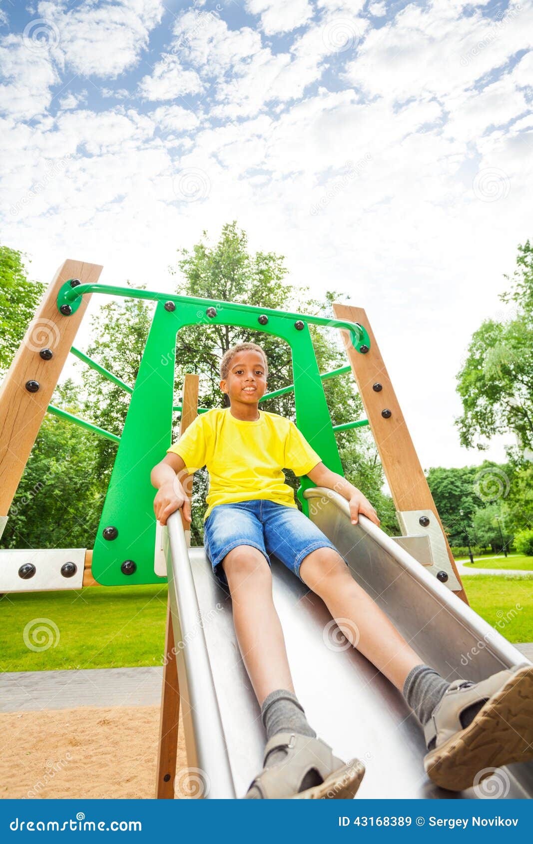 Boys Holds Sides of Chute and Sits on it Stock Image - Image of active ...