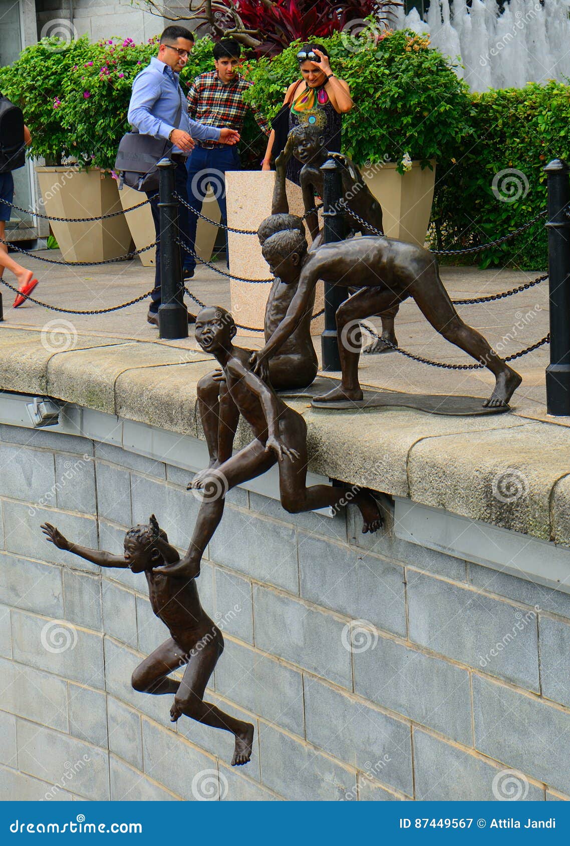 Two Boys Jumping On Concrete Blocks On The Seashore Editorial Image ...