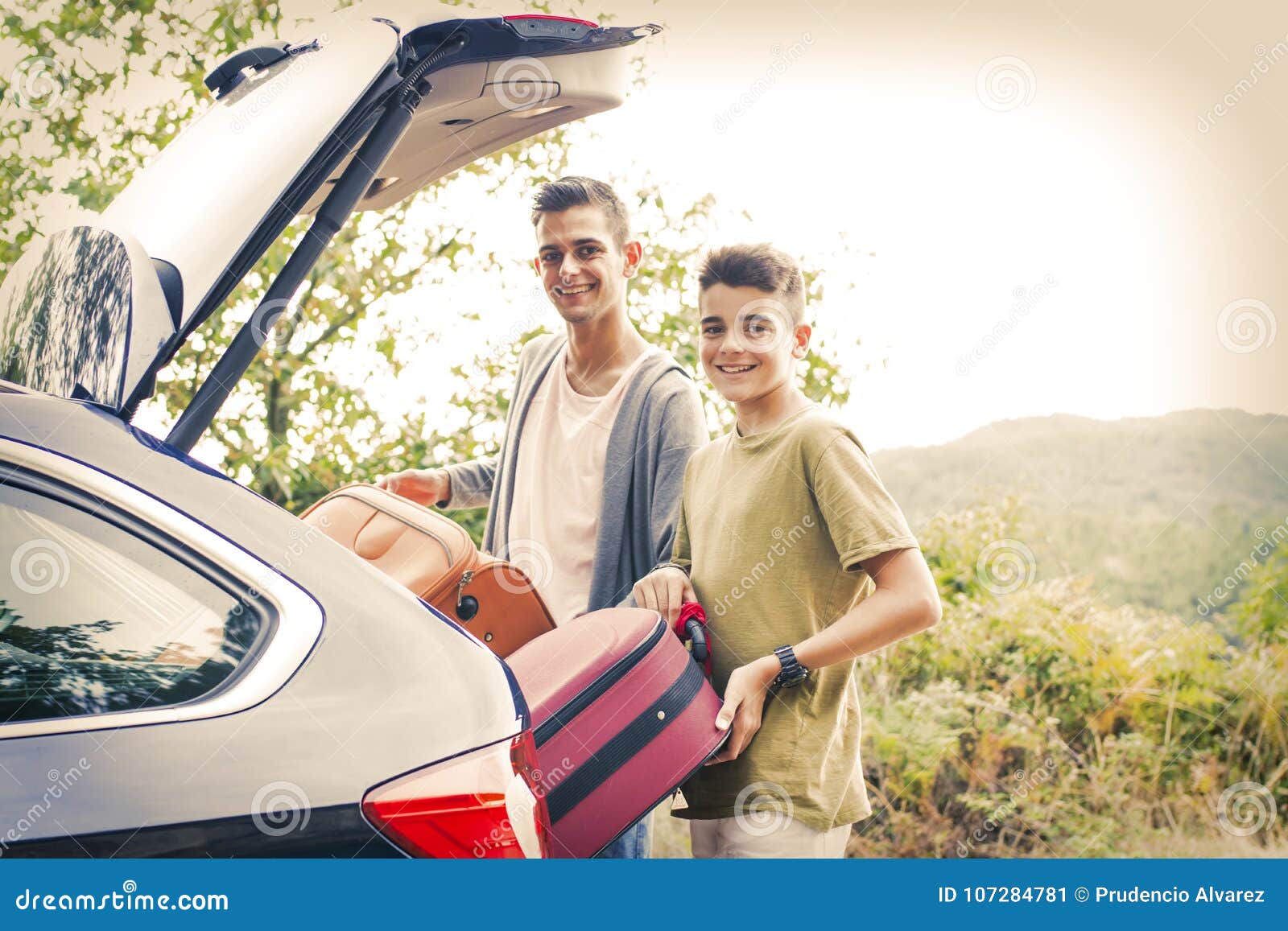 Boys Loading Car Boot for Holidays Stock Image - Image of suitcases ...