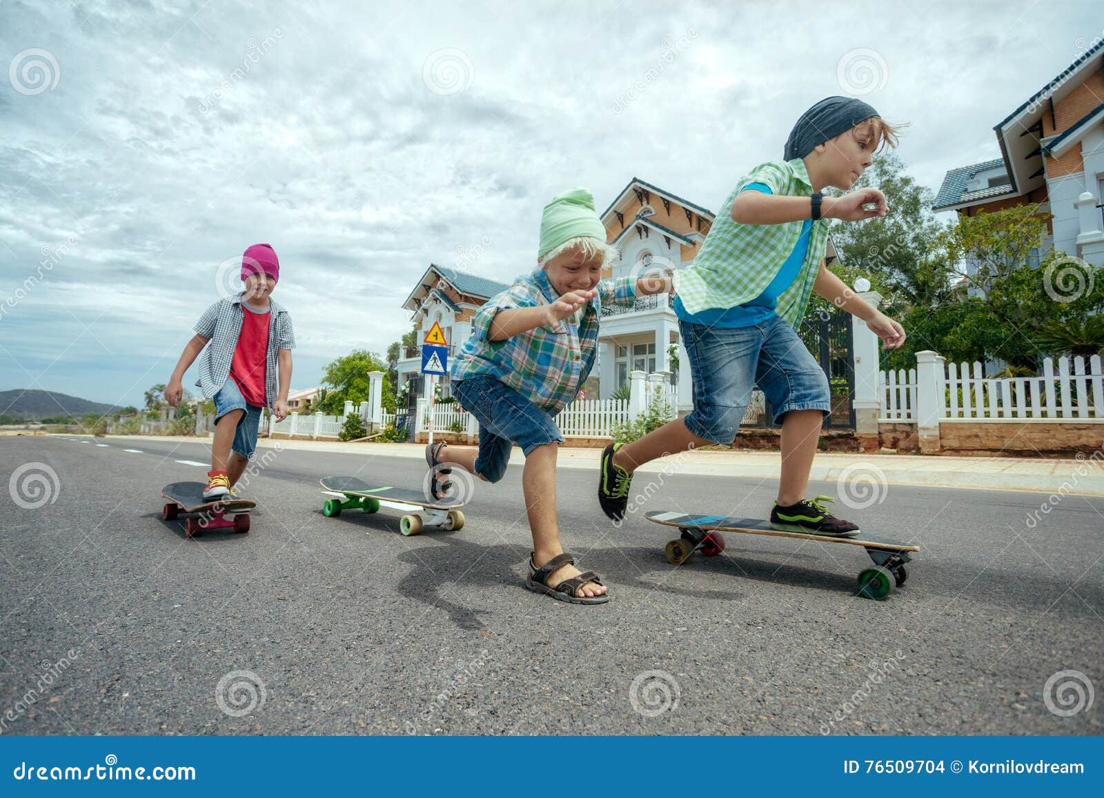 Boys on longboard skates stock photo. Image of motion - 76509704