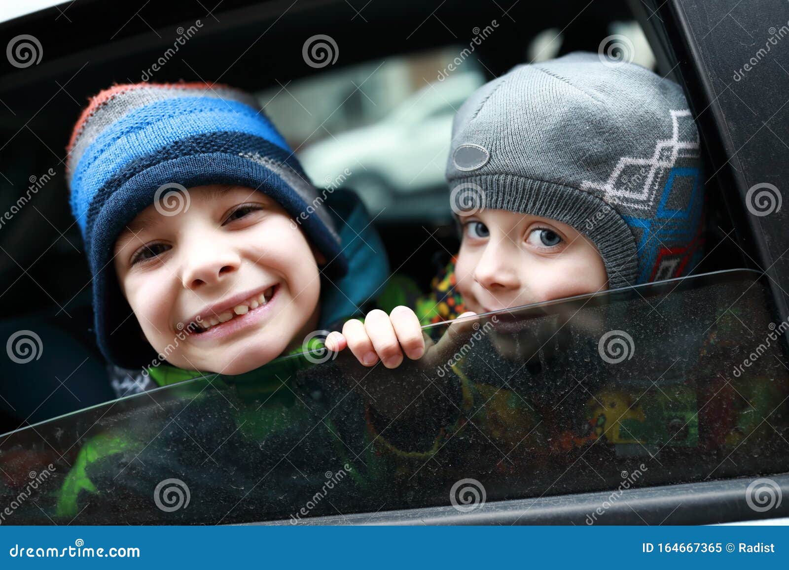 Boys Look Out of Car Window Stock Image - Image of children, person ...