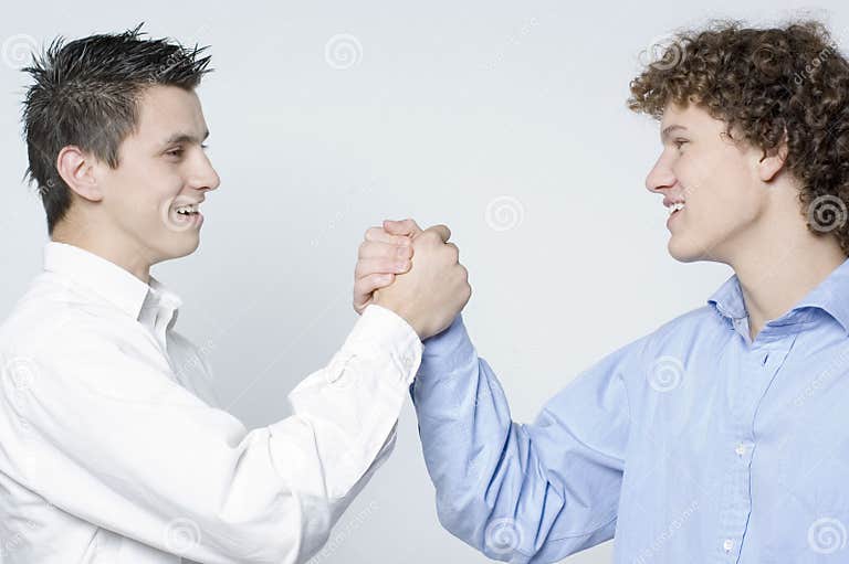 Boys / Partnership Handshake Stock Photo - Image of light, class: 324914