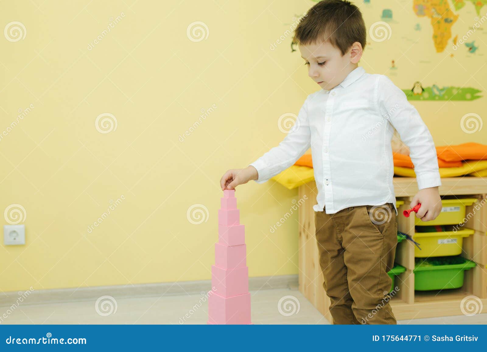 Boys Play in Different Intelectual Games in Preschool Classroom Stock ...