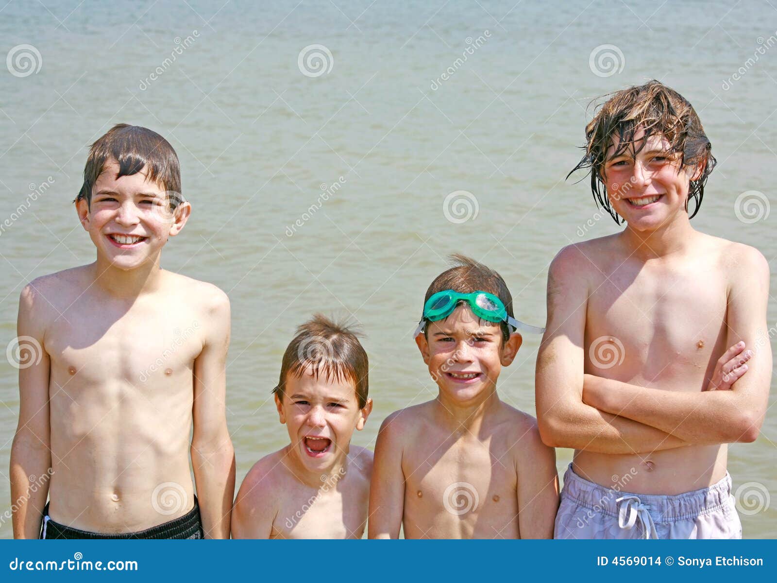 Boys Playing at the Beach stock photo. Image of beach - 4569014