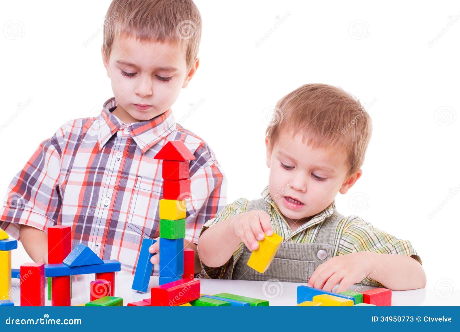 Boys playing with blocks stock image. Image of friends - 34950773