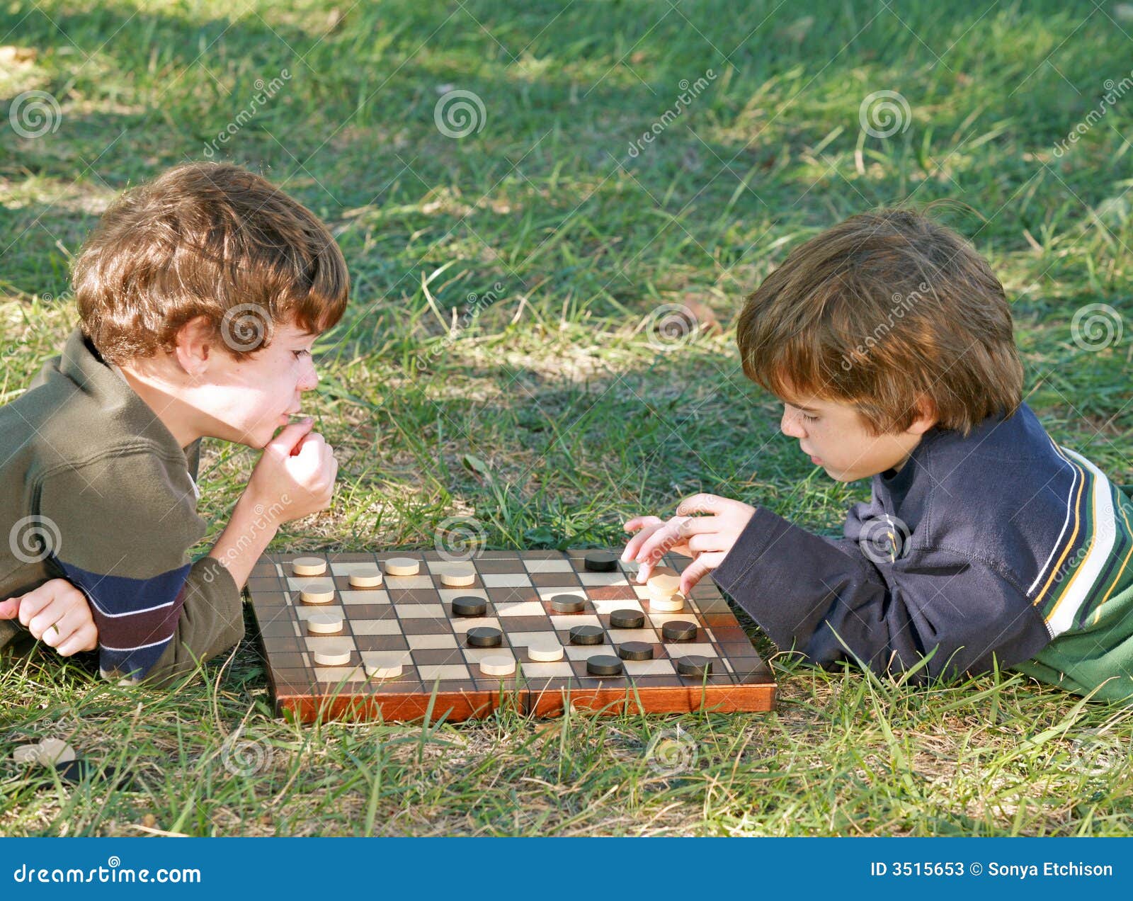 Boys Playing Checkers stock image. Image of friend, family - 3515653