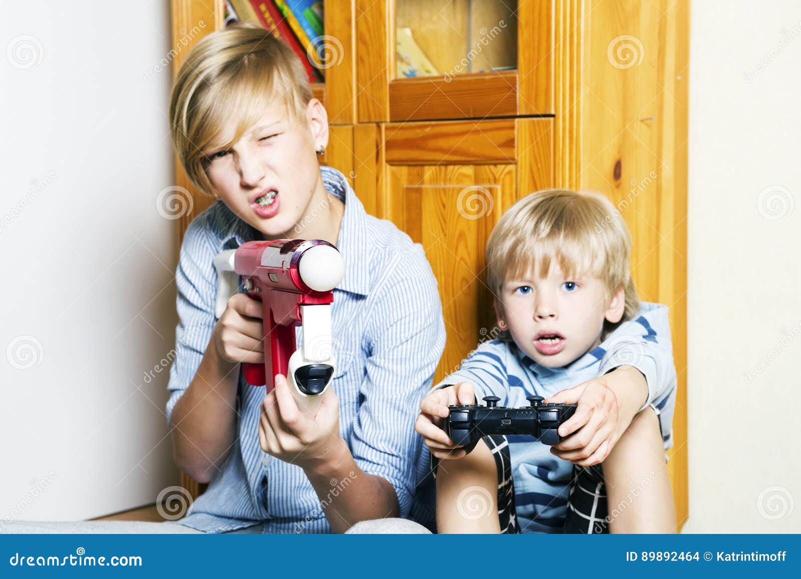 Boys Playing a Computer Games Stock Photo - Image of emotional, shirt ...