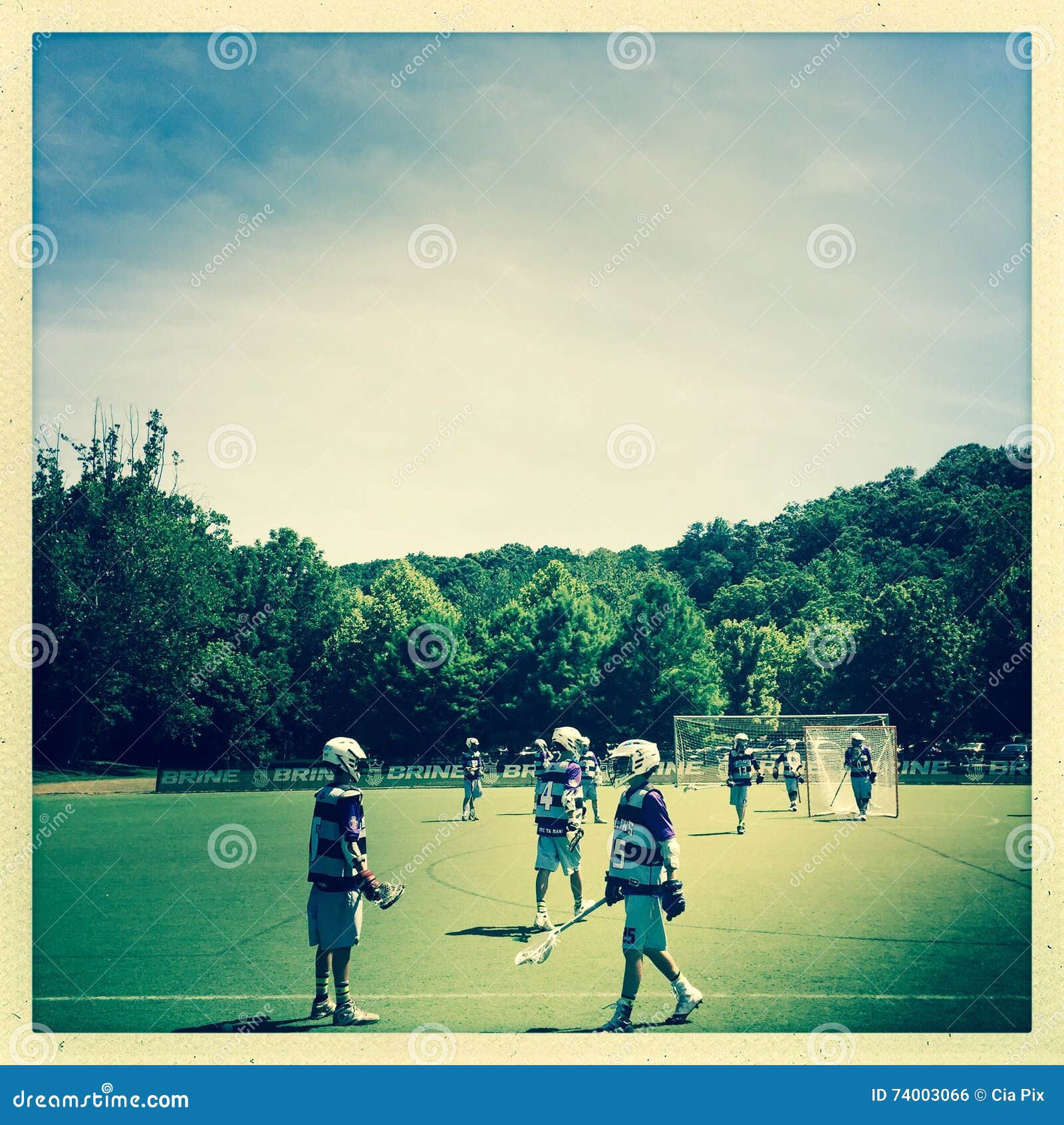 Boys playing Lacrosse editorial photo. Image of match - 74003066