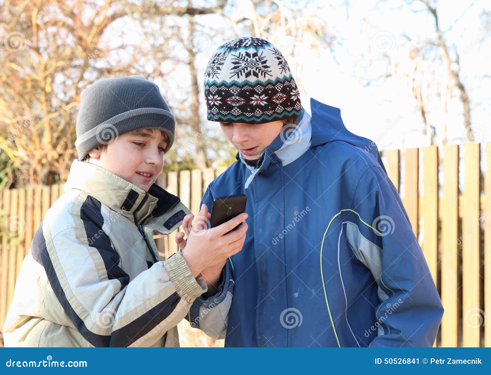Boys Playing with Mobil Phone Stock Image - Image of kids, portrait ...