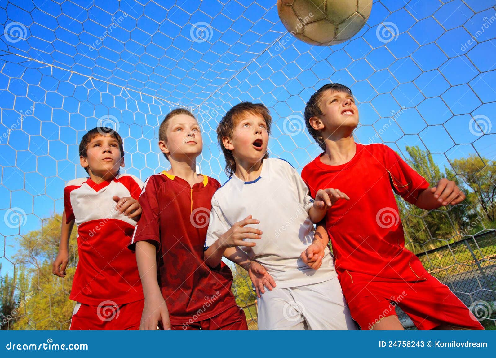 Boys playing soccer stock image. Image of playing, goal - 24758243
