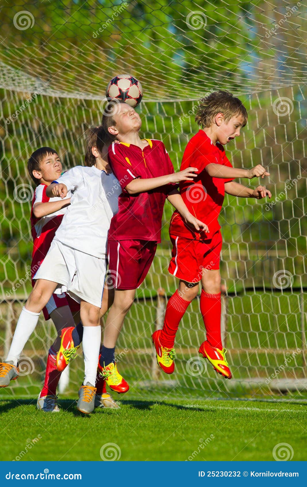 Boys playing soccer stock photo. Image of aggression - 25230232