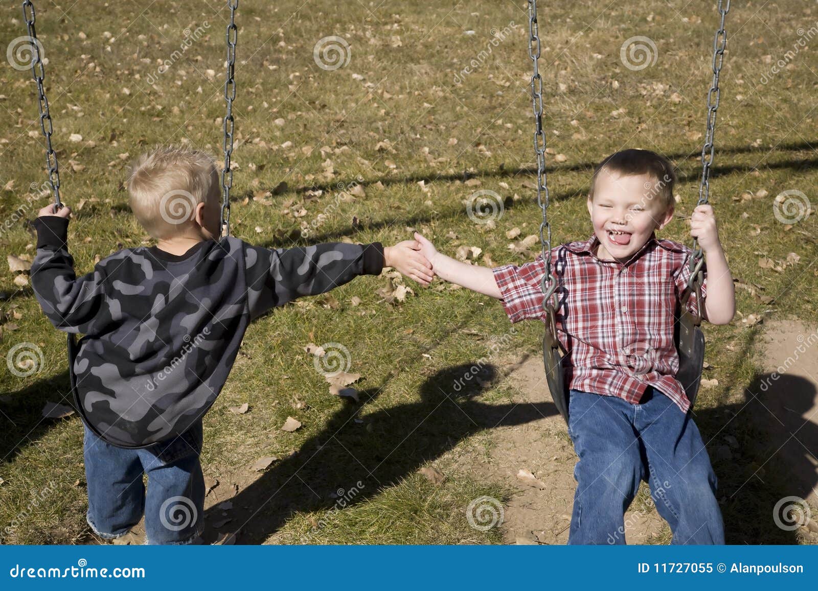 Boys playing on swing stock image. Image of friends, chain - 11727055