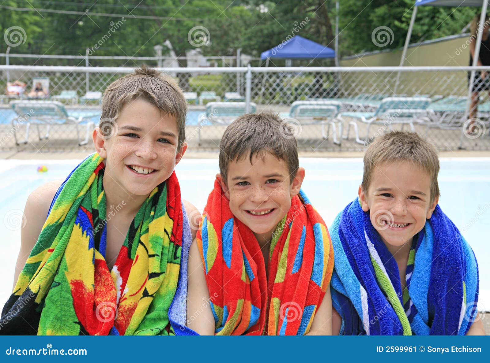 Boys at the Pool stock image. Image of happiness, face - 2599961