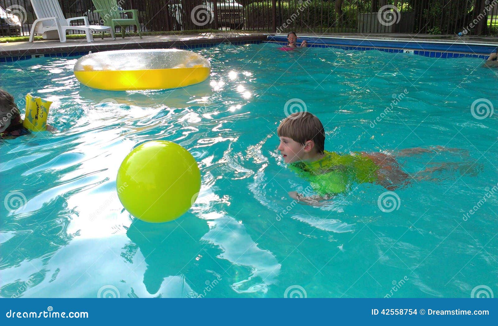 Boys in Pool Playing with Ball Editorial Stock Image - Image of boys ...