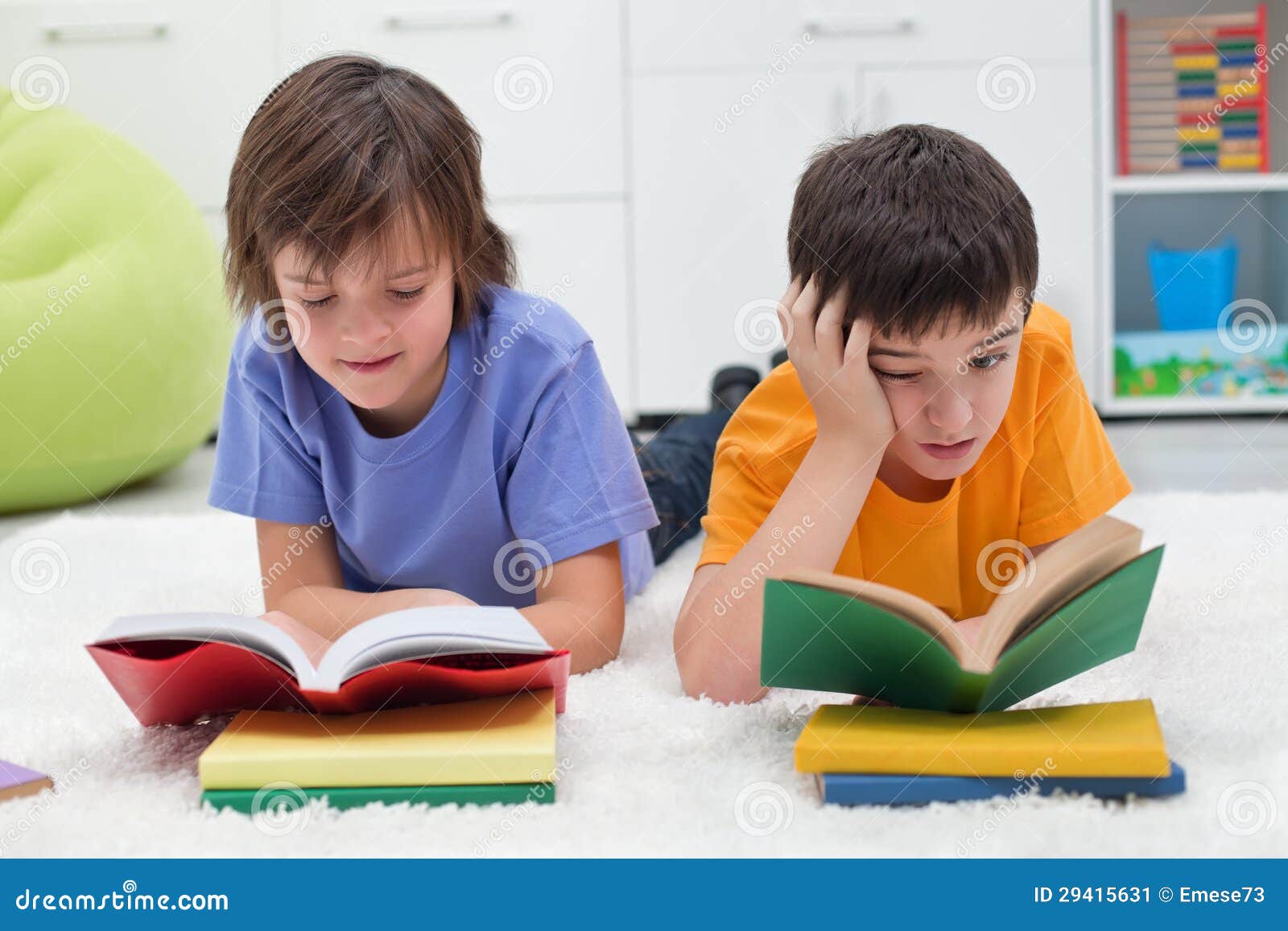 Boys reading books stock image. Image of lying, schoolboy - 29415631