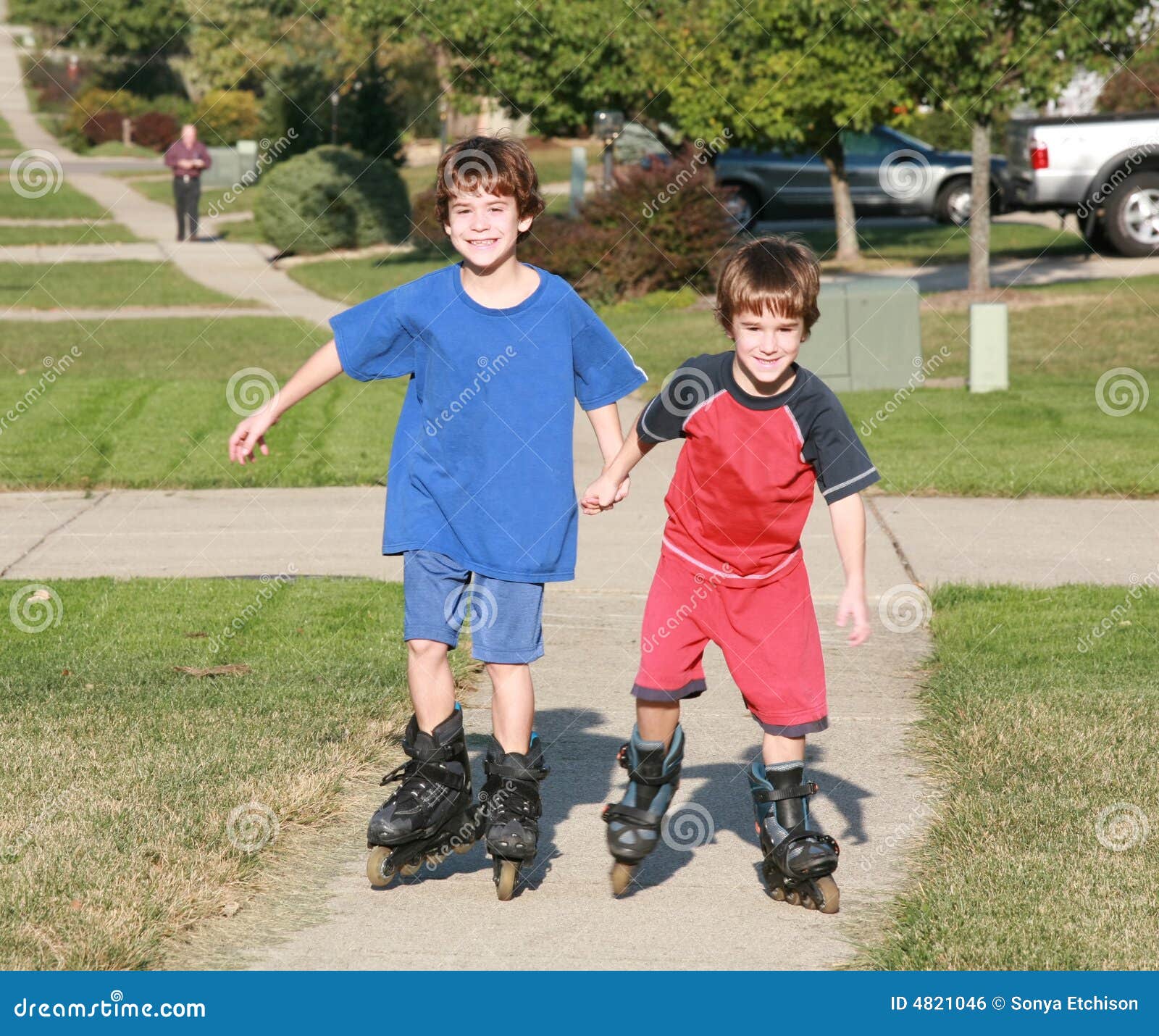 Boys Rollerblading stock photo. Image of family, emotions - 4821046
